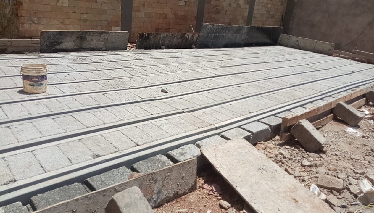 Tank cover using beam and block - EcoConcrete Kenya